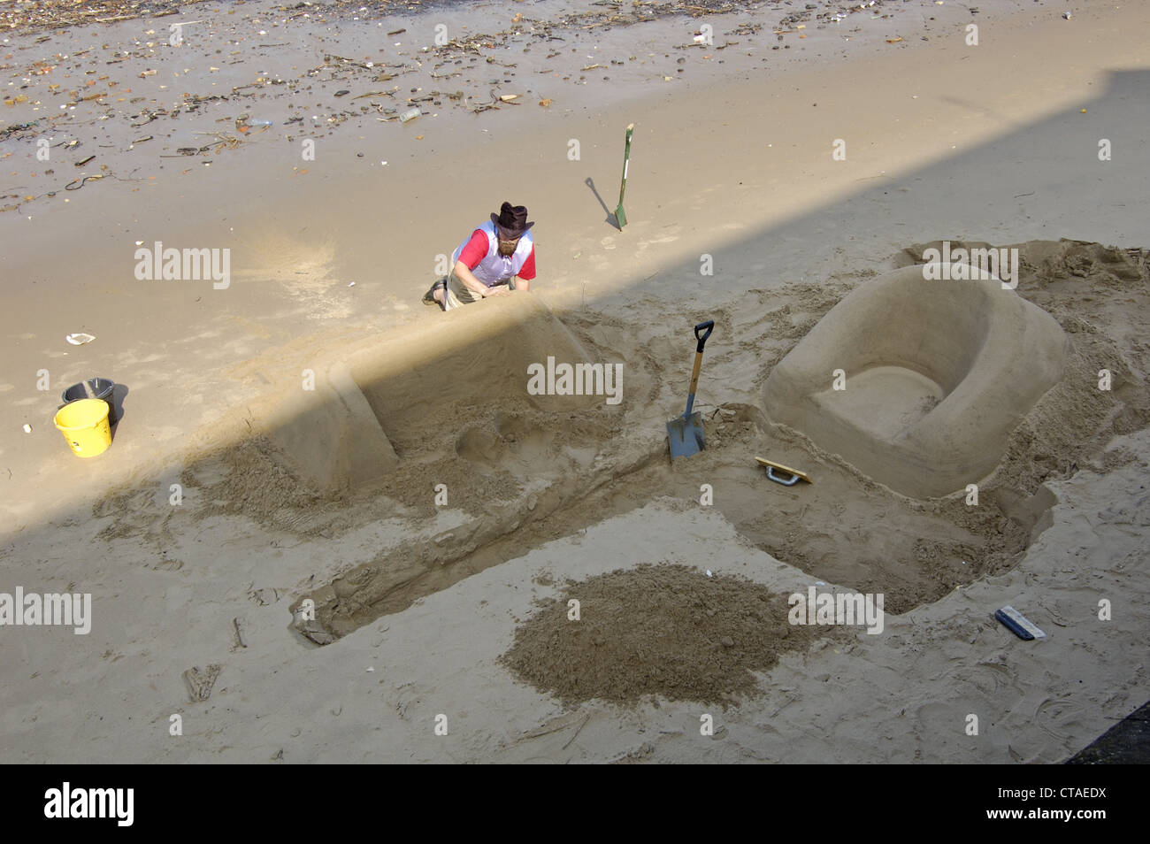 Man creating a Sand Sculpture on the South Bank in London, England ...