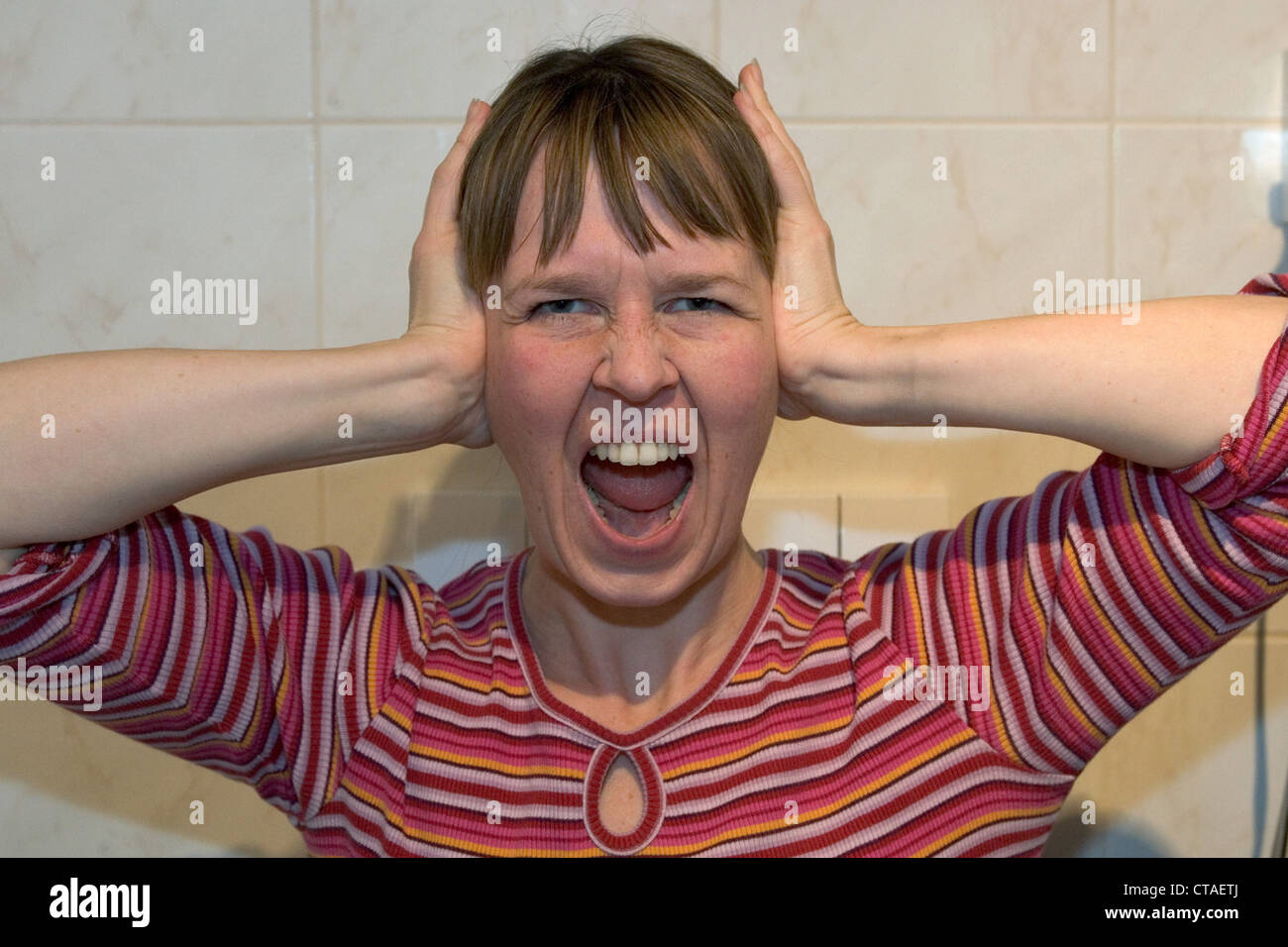A screaming woman Stock Photo - Alamy