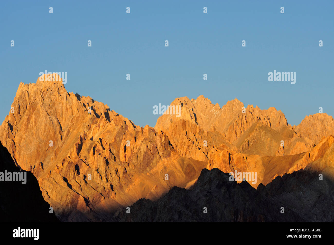 Evening light at jagged rocky summit, Zanskar Range Traverse, Zanskar ...
