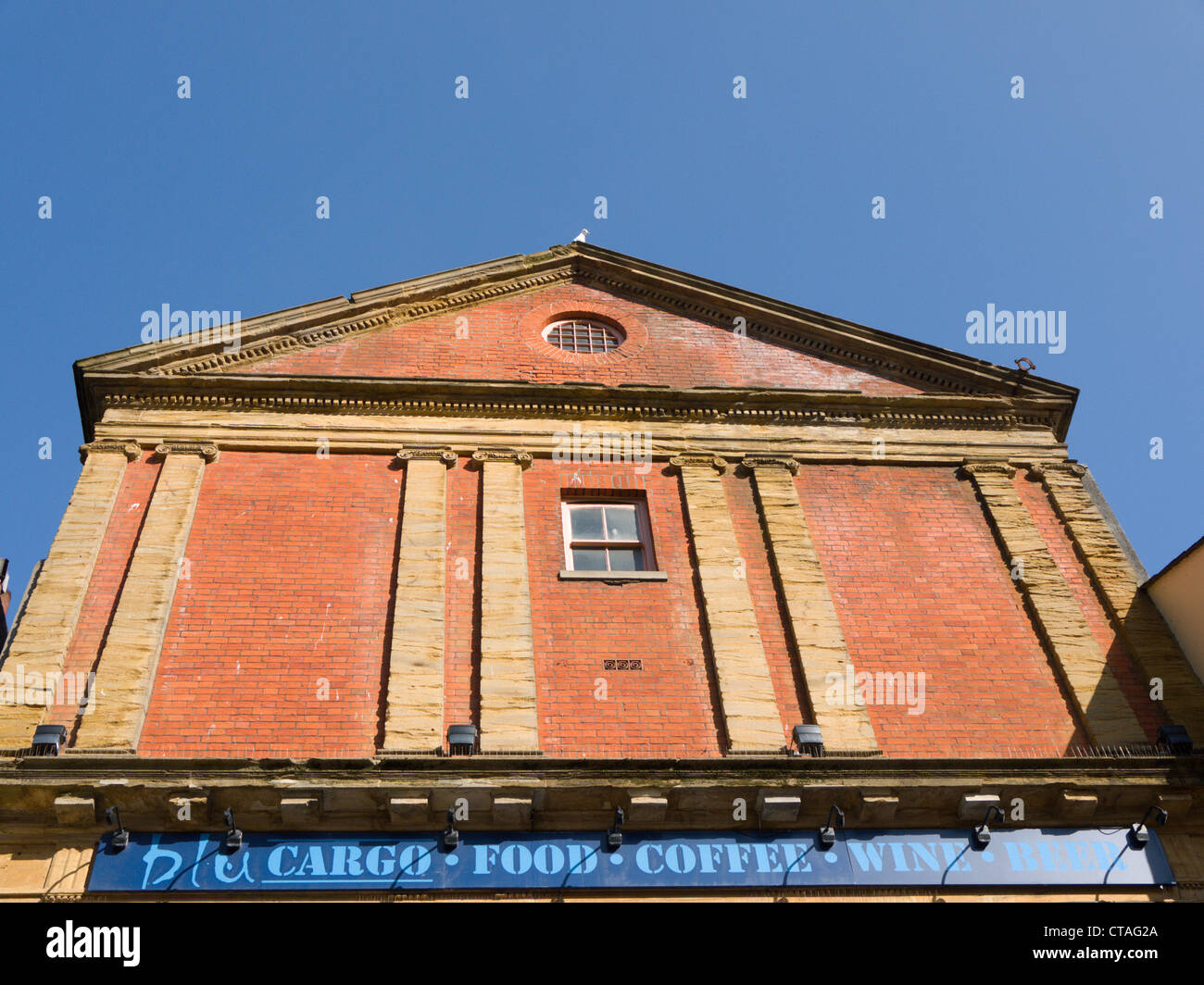 Old warehouse converted into a bar and restaurant Stock Photo - Alamy