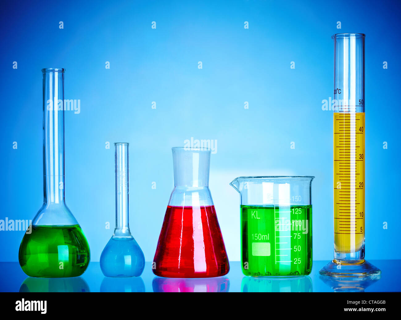 Test Tubes on blue background Stock Photo - Alamy