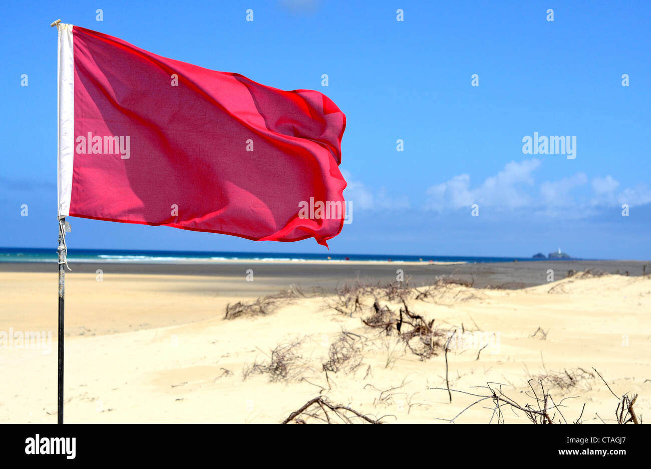 Red flag beach Cornwall UK Stock Photo - Alamy