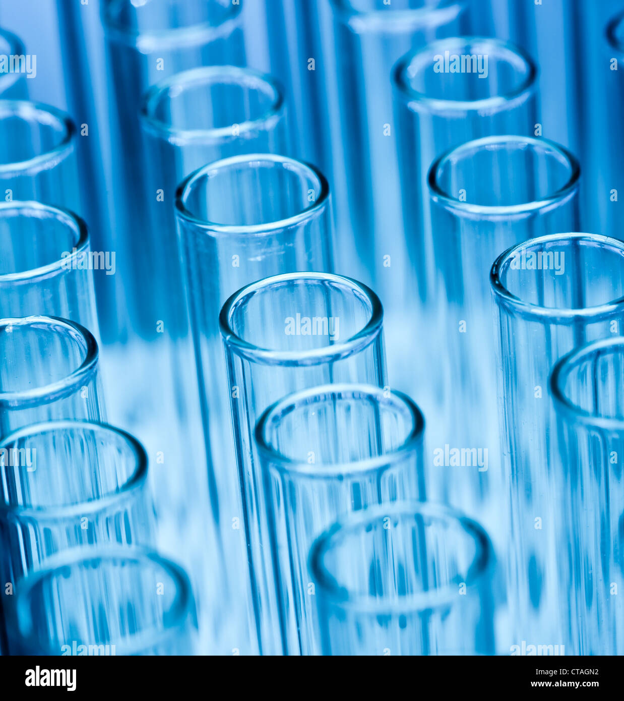 Test Tubes on blue Stock Photo - Alamy