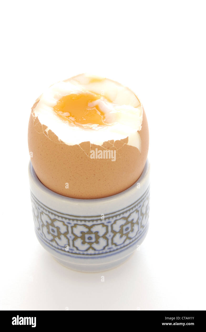 Open soft-boiled egg isolated on a white background Stock Photo - Alamy