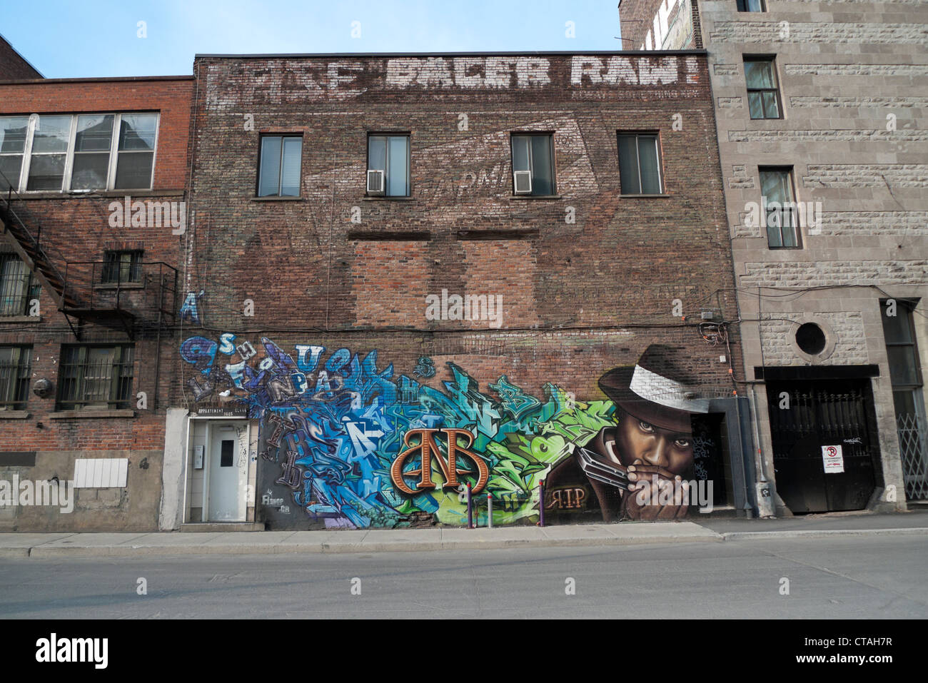 View of building with graffiti of BNB Paul Frappier a black hip hop ...