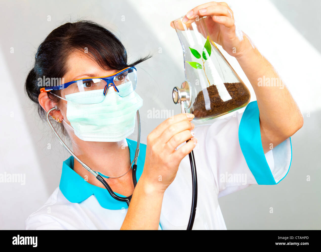 doctor checking the health of his subject Stock Photo - Alamy
