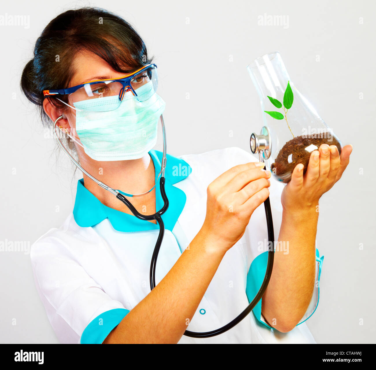 doctor checking the health of his subject Stock Photo - Alamy