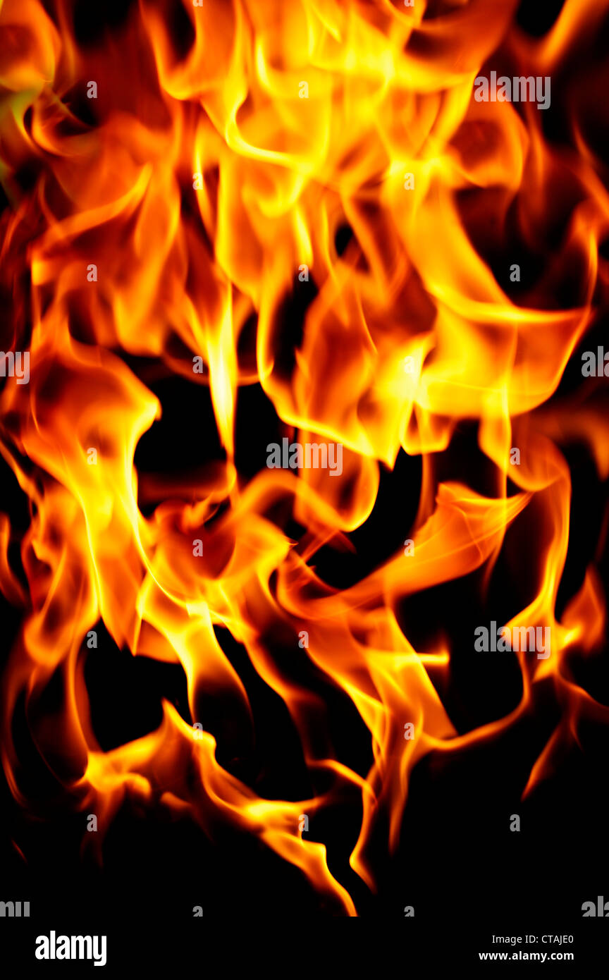 Fire photo on a black background Stock Photo - Alamy
