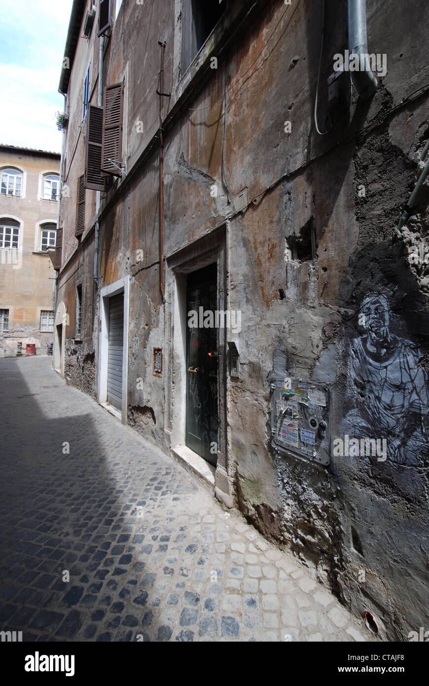 Picture of a run down street in Rome with graffiti Stock Photo - Alamy