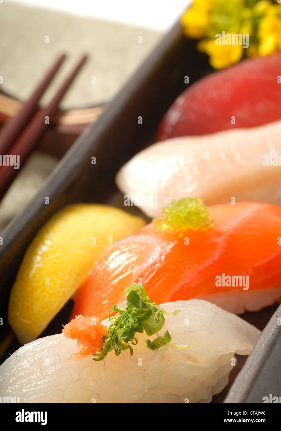 Fresh Japanese sushi nigiri with citrus Stock Photo - Alamy