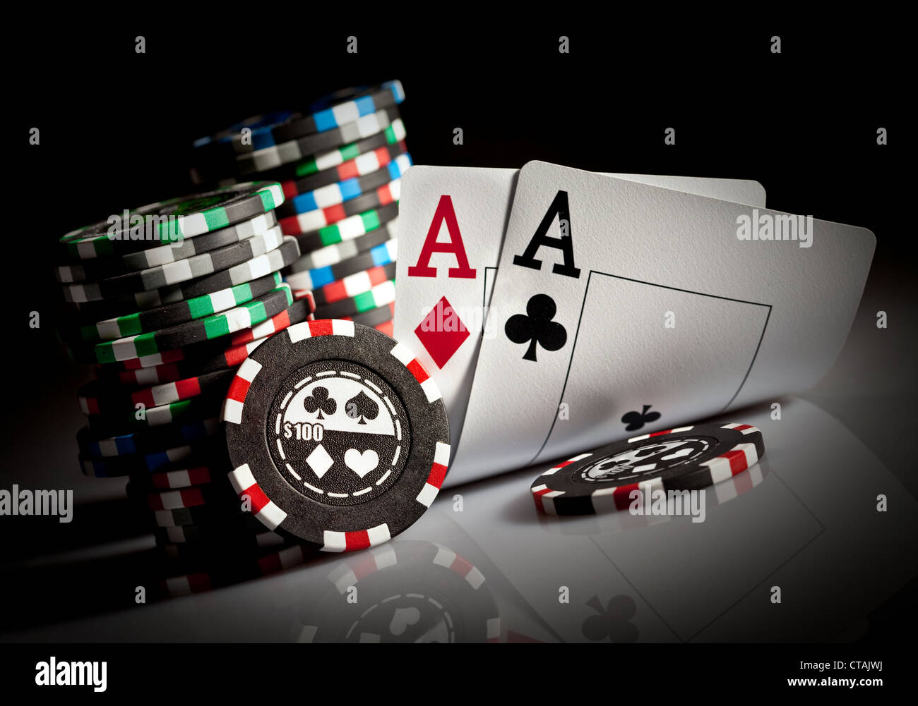 Photo gambling chips on the dark Stock Photo - Alamy