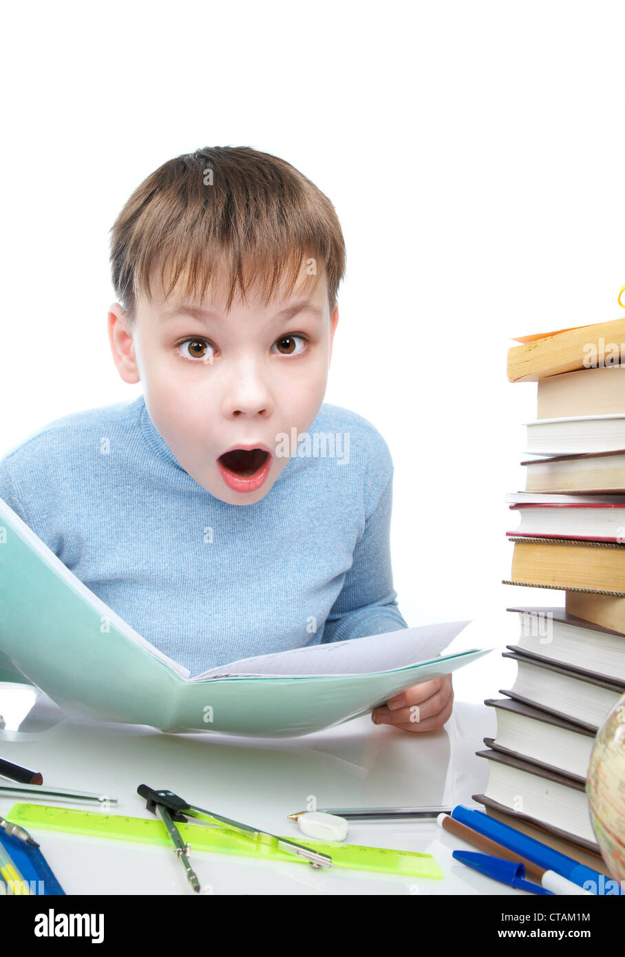 Boy behind table books hi-res stock photography and images - Alamy