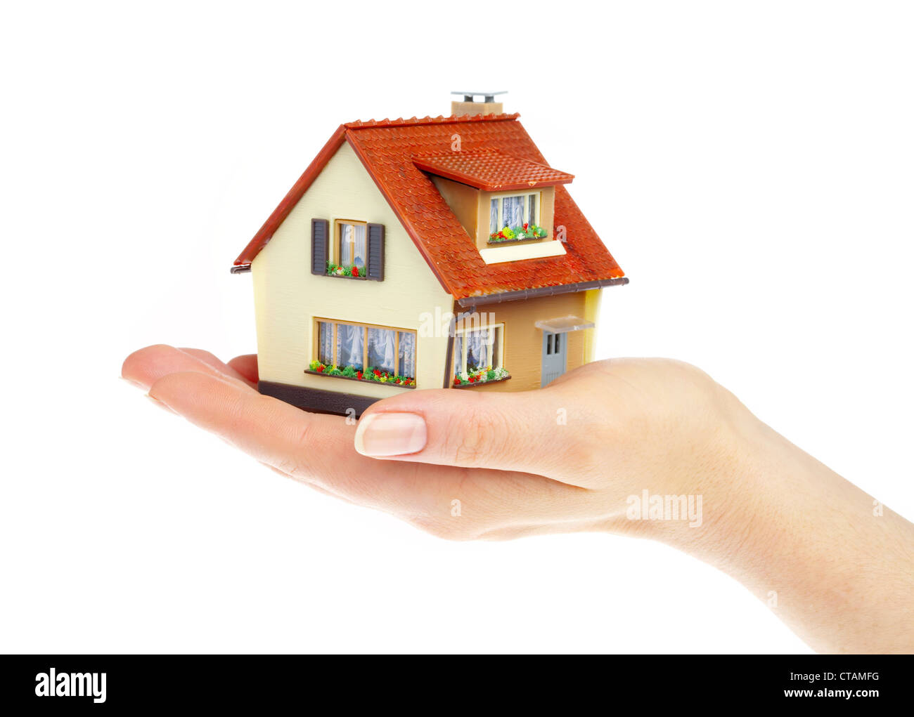 The house in human hands Stock Photo - Alamy