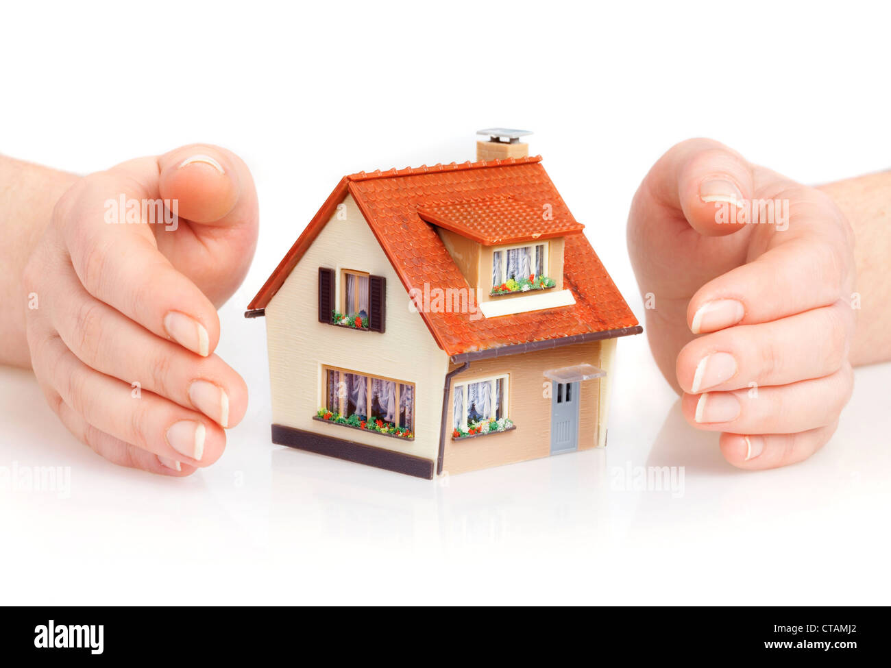 The house in human hands Stock Photo - Alamy