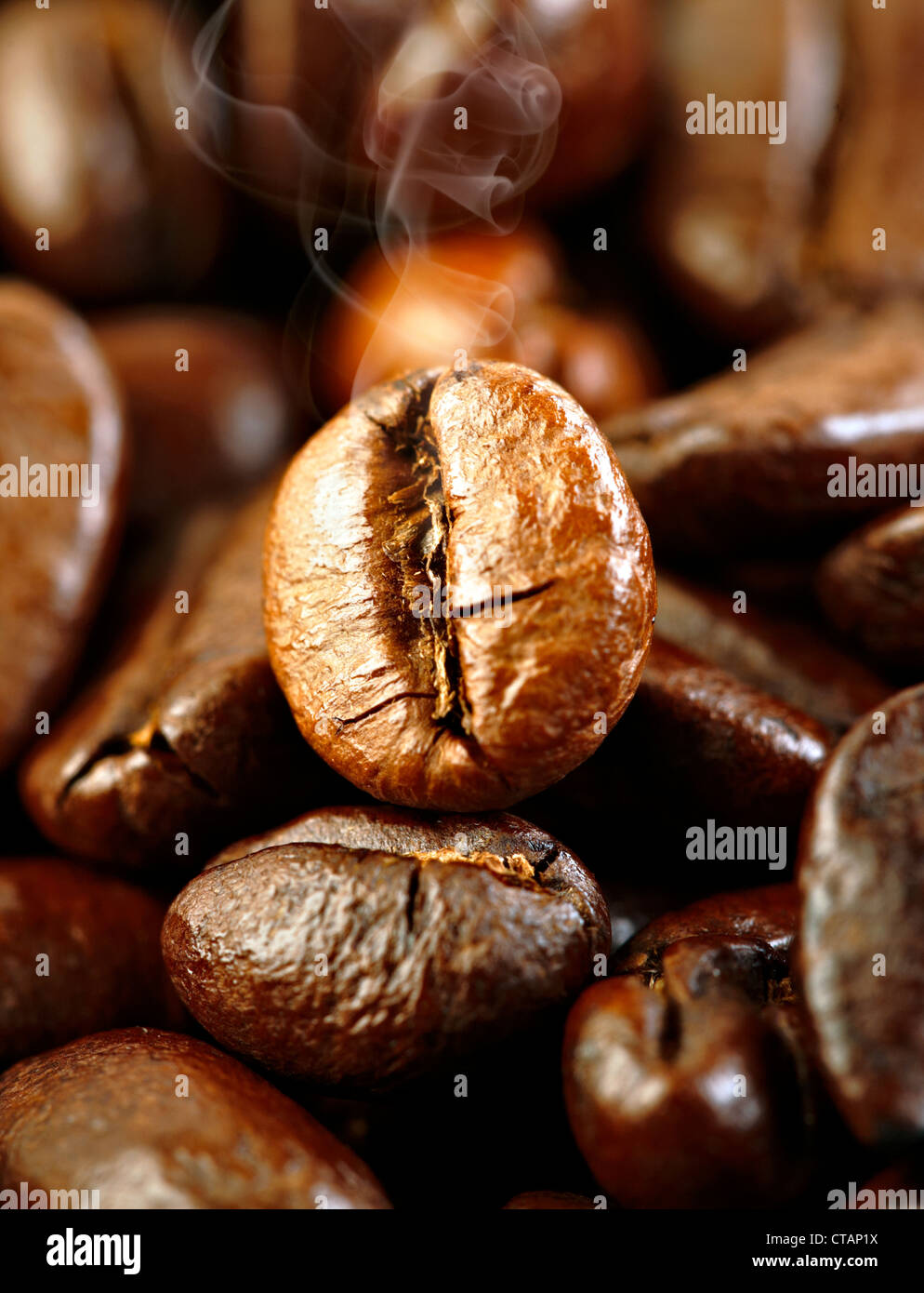 Fragrant fried coffee beans Stock Photo - Alamy