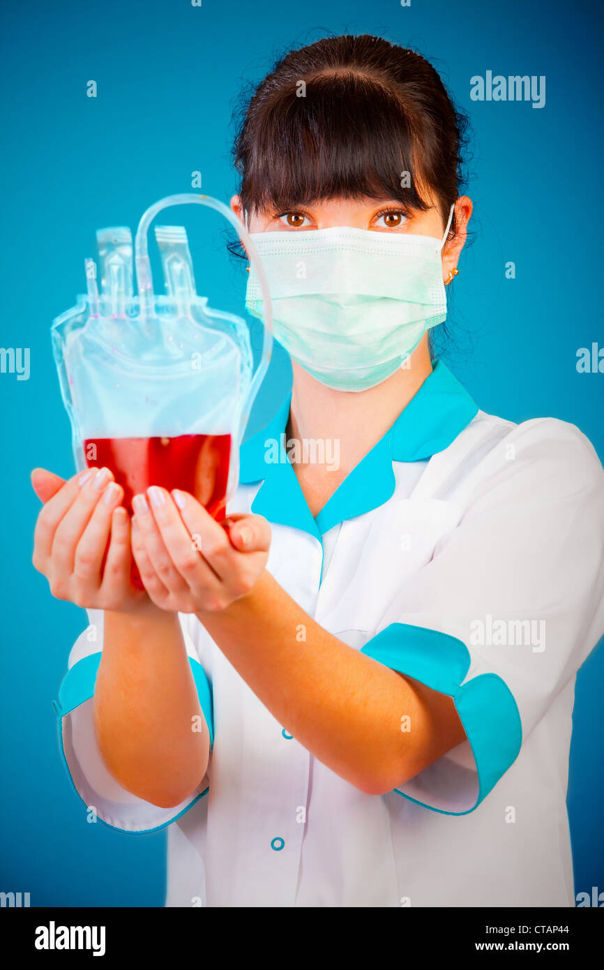 doctor with a package of donor blood Stock Photo - Alamy