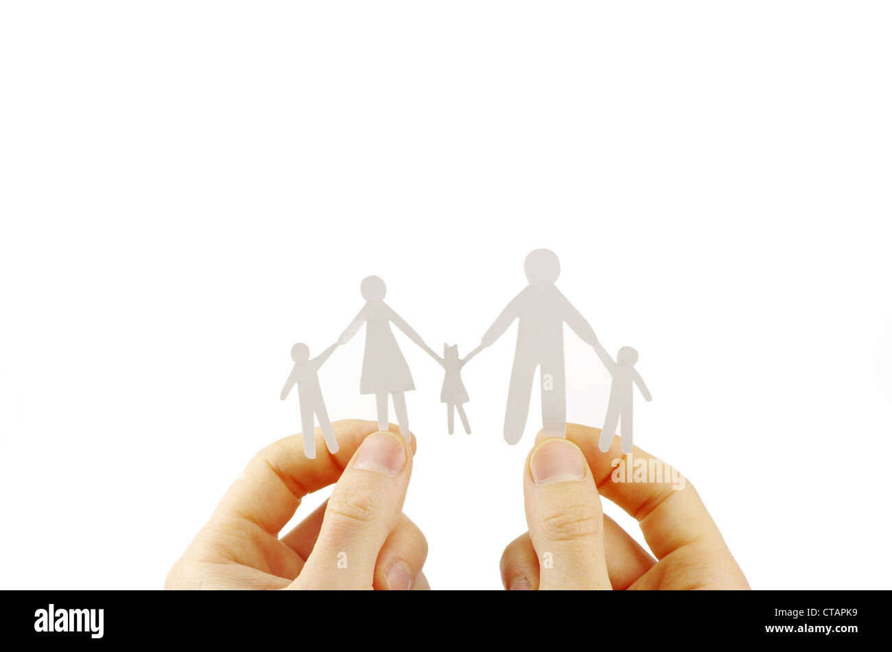 Paper family in hands isolated on white background Stock Photo - Alamy