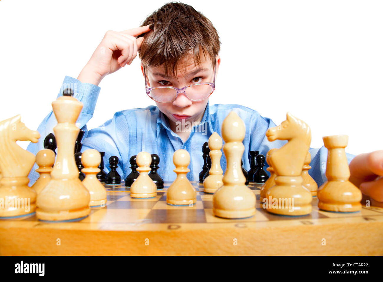 Nerd play chess on a white background Stock Photo - Alamy