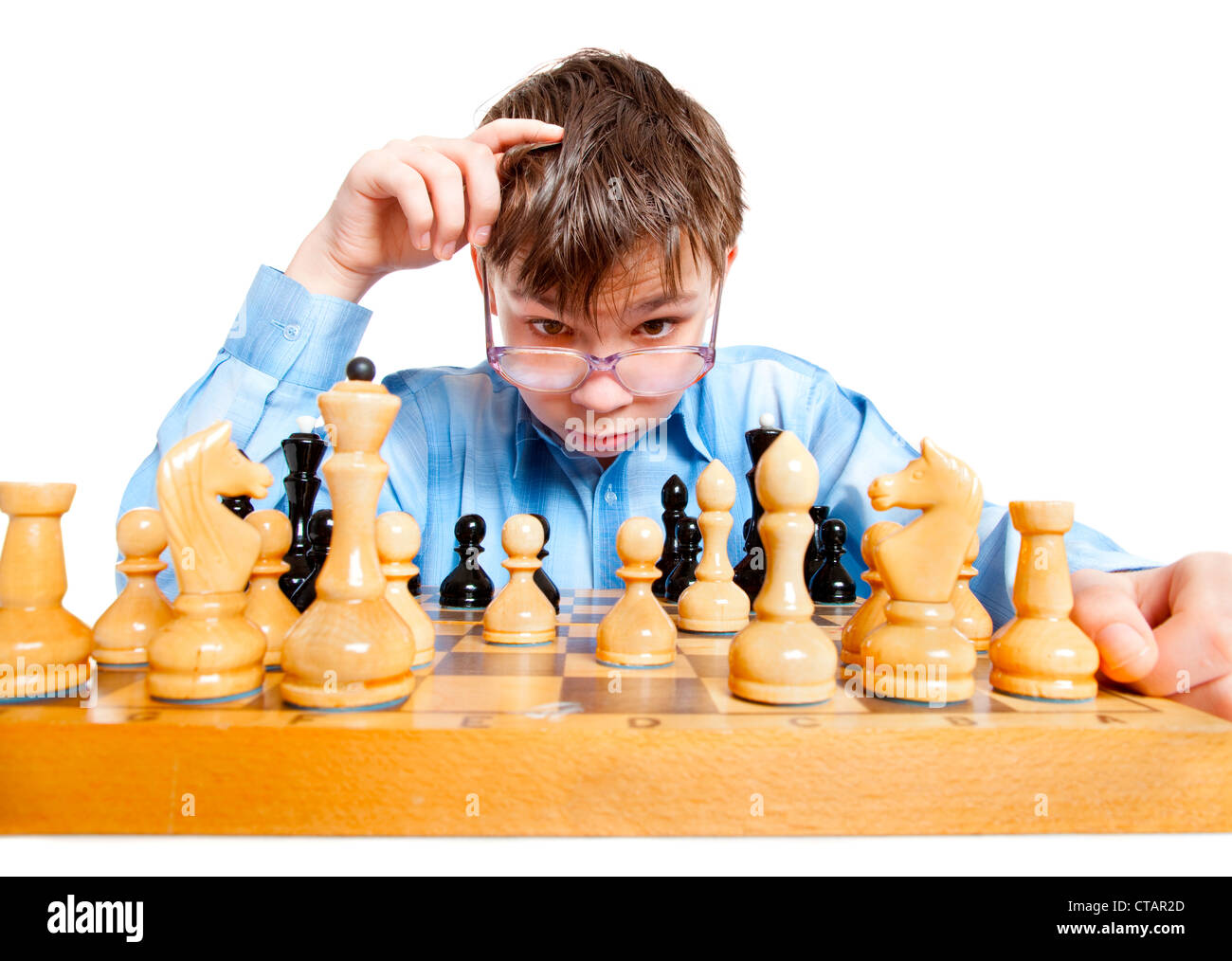 Nerd play chess on a white background Stock Photo - Alamy