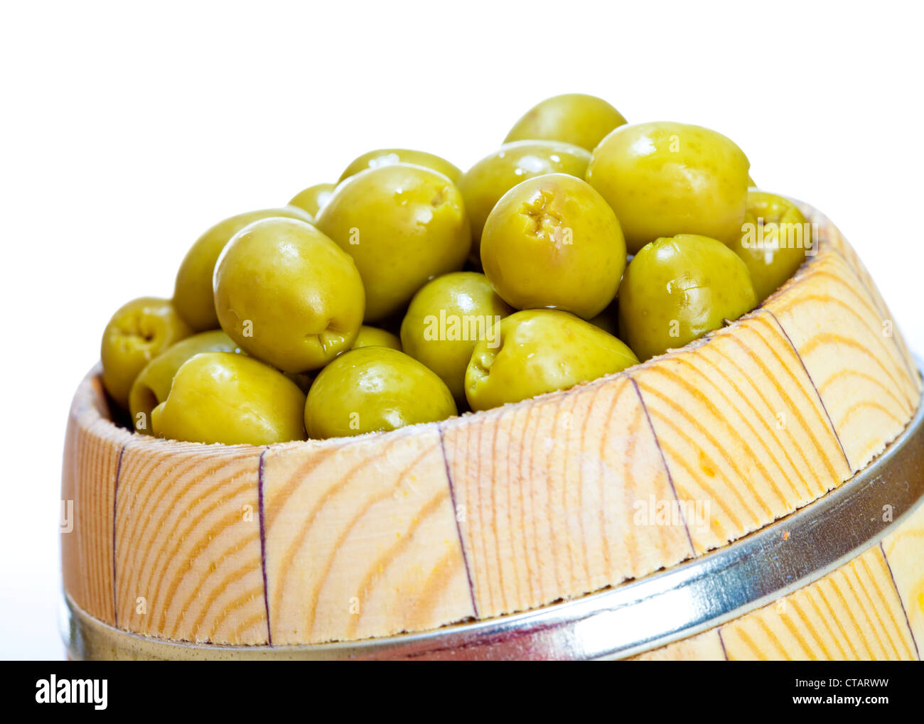 olive in small barrel on a white background Stock Photo - Alamy