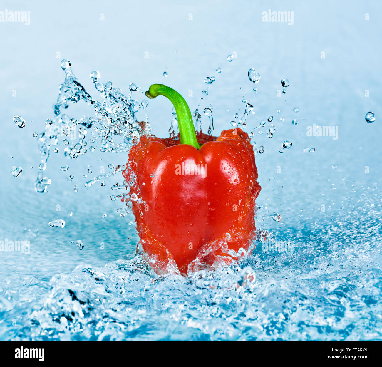 fresh water splash on peppers Stock Photo - Alamy