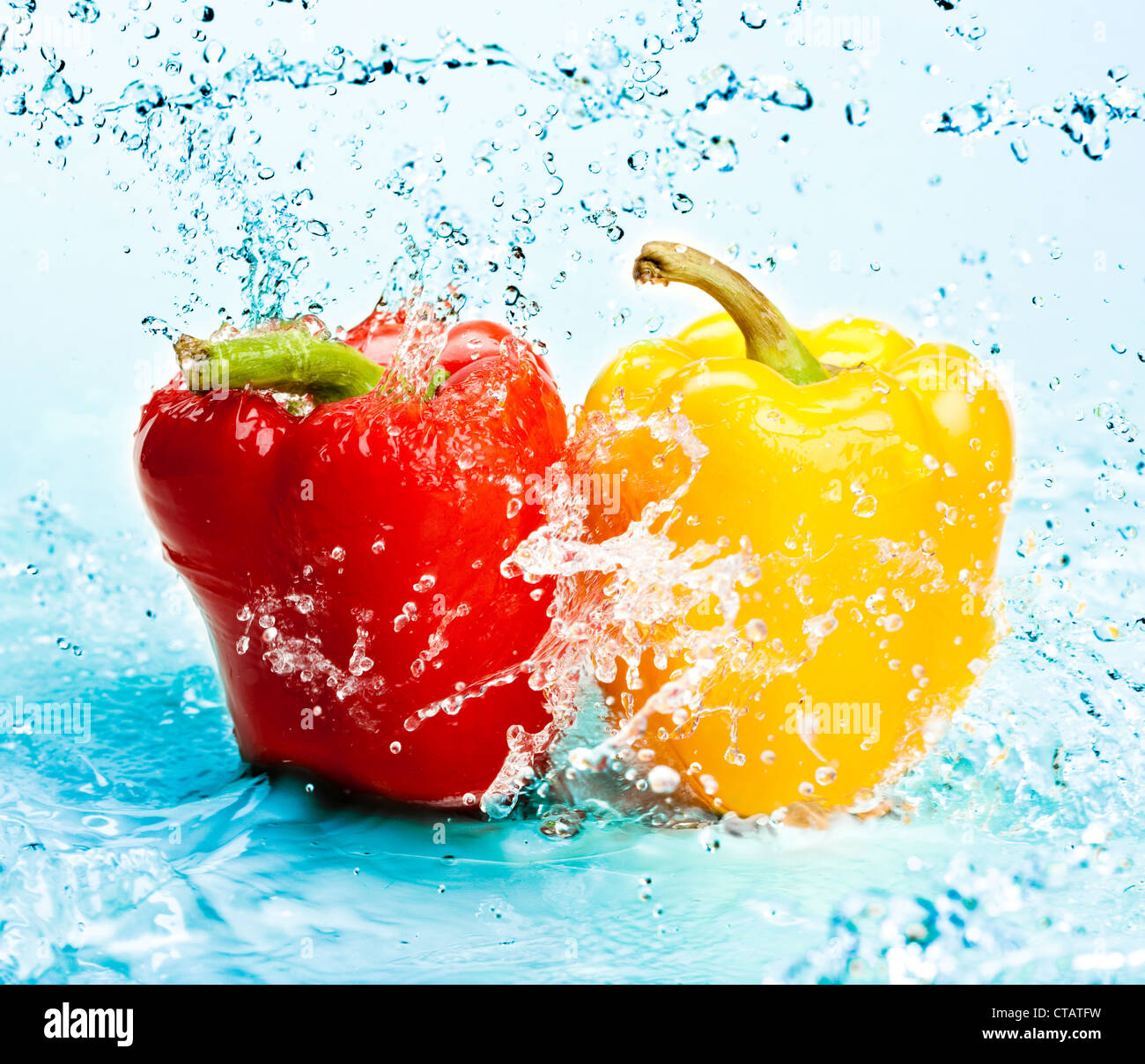 fresh water splash on peppers Stock Photo - Alamy