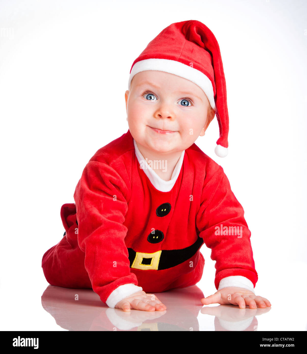 Baby In Santa Costume At Christmas on the white Stock Photo - Alamy