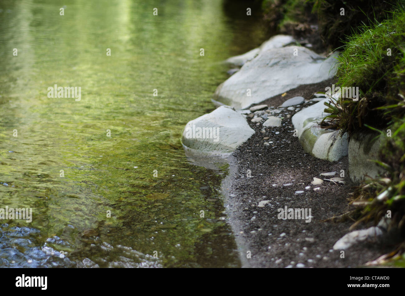 Riverbank with stones hi-res stock photography and images - Alamy