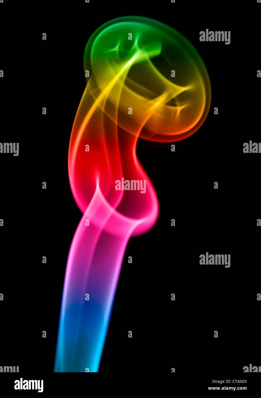 Multi-coloured smoke on a black background Stock Photo - Alamy