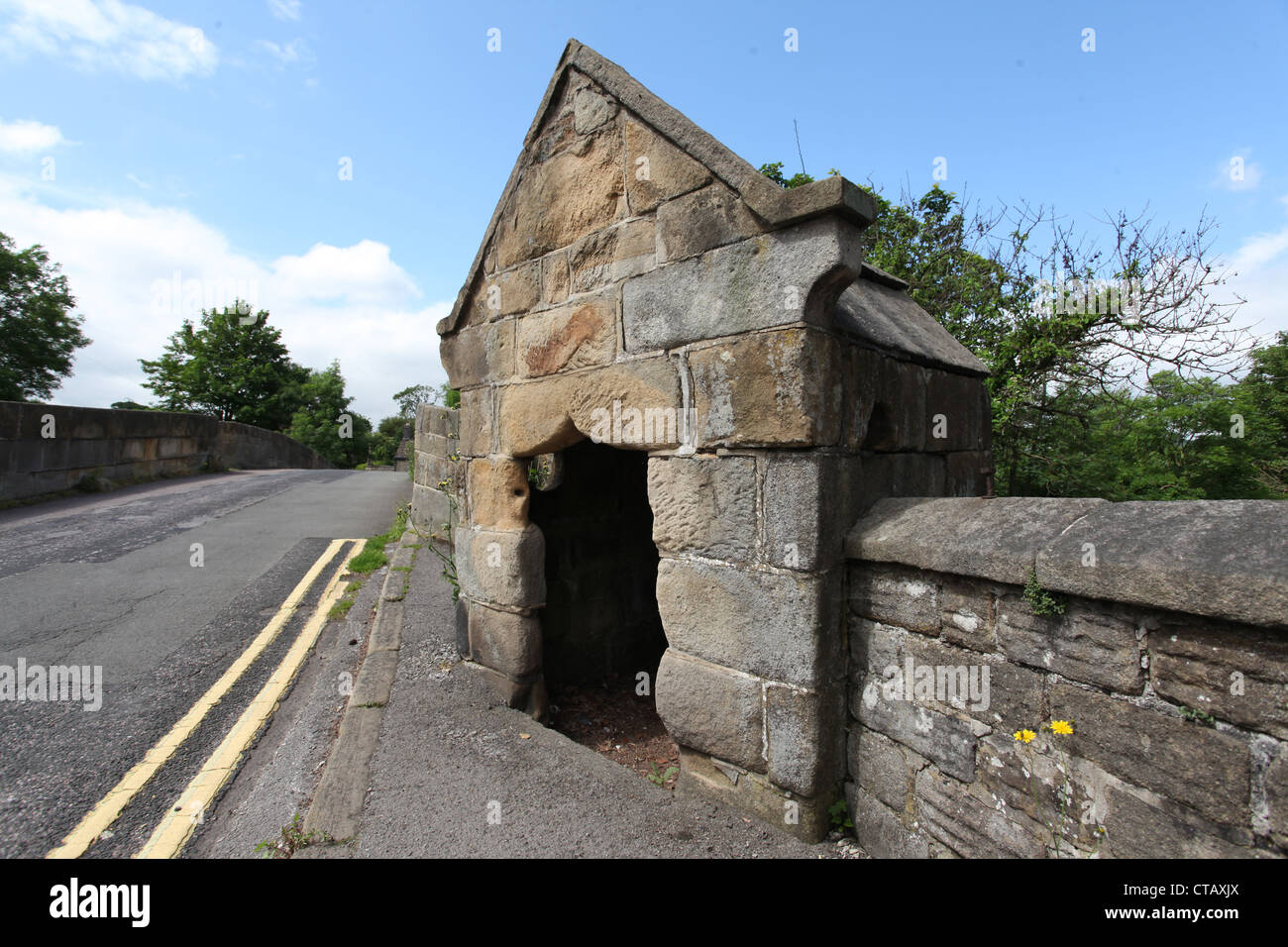 Tiny Toll House on the 17th century bridge over the River Derwent at ...