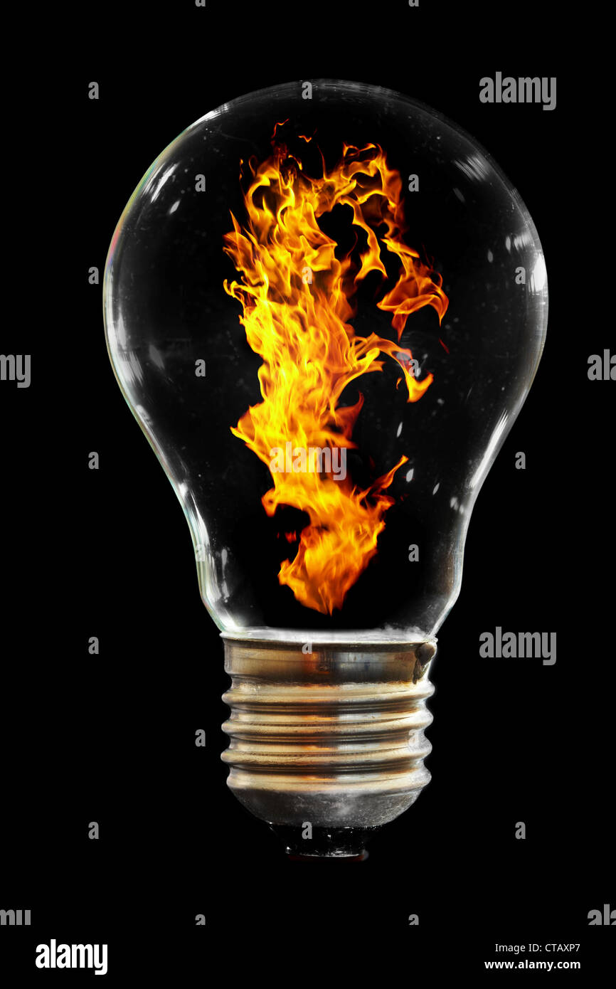 light bulb with fire on the black Stock Photo - Alamy
