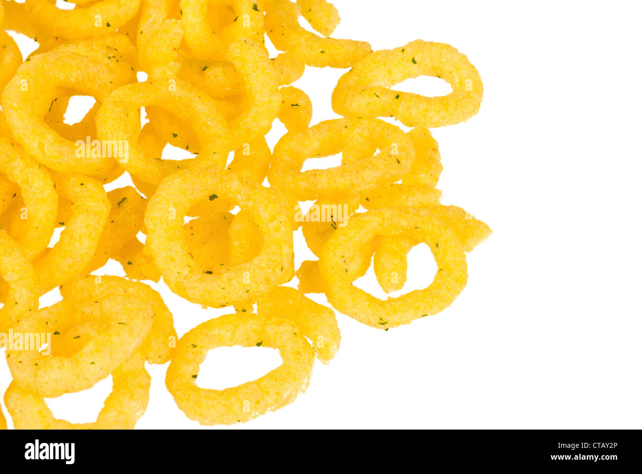Crunchy maize ring snacks with onion flavor Stock Photo - Alamy
