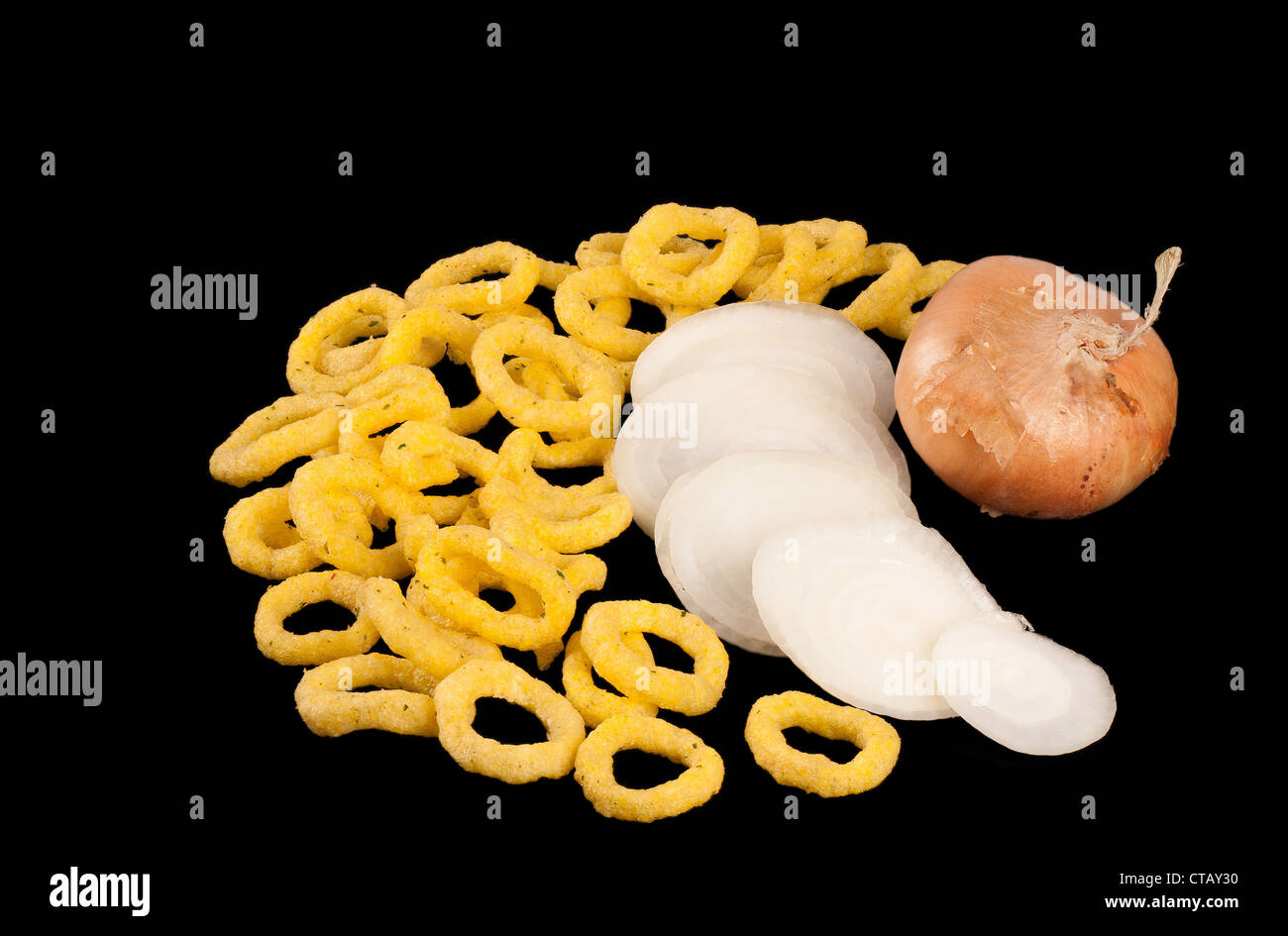 Crunchy onion flavored maize snacks and their ingredient Stock Photo ...
