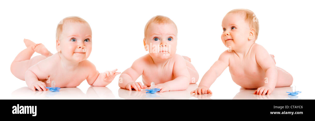 triplet babies on a white background Stock Photo - Alamy