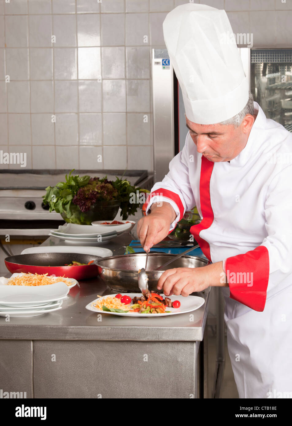 portrait of male chef in kitchen Stock Photo - Alamy