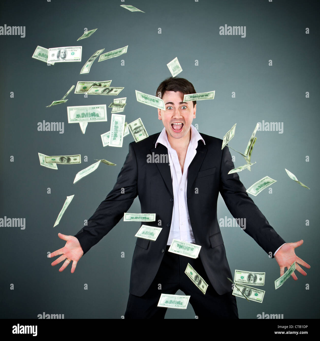man in a suit throws money Stock Photo - Alamy