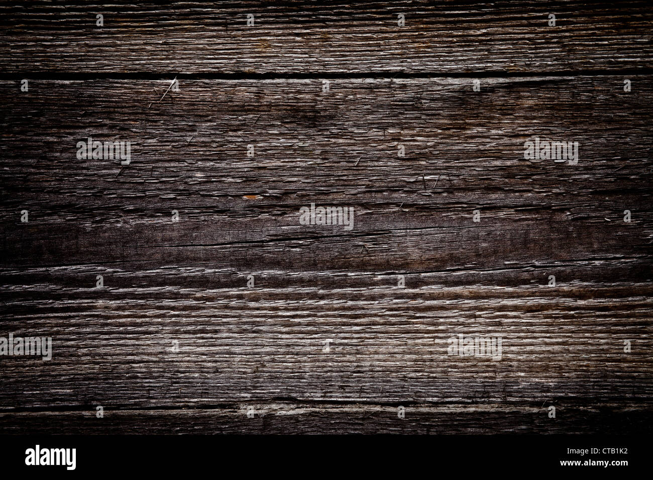Old stained board. A dark background Stock Photo - Alamy