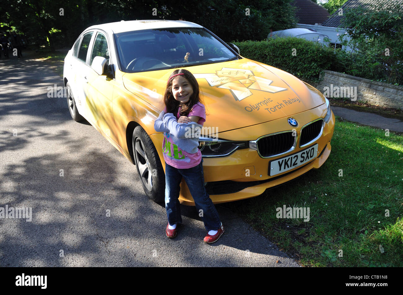 A little girl ( 5 year old) with the Olympic Torch Relay car, Caversham ...