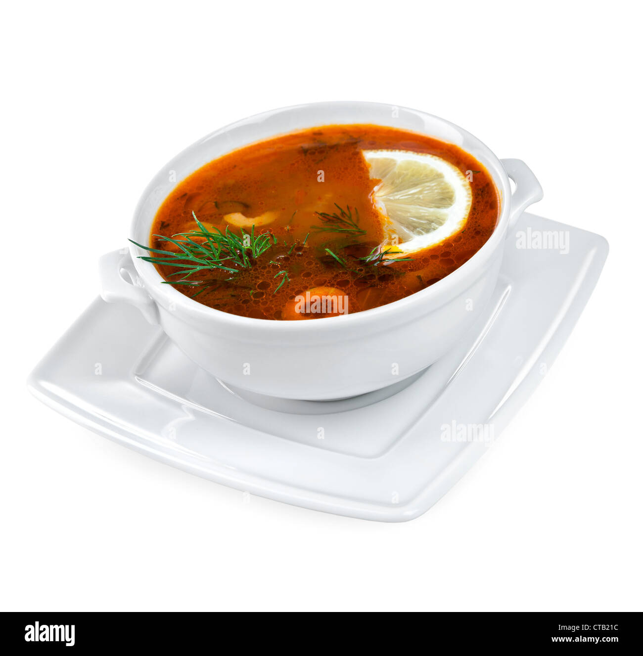 Fish soup on a white background Stock Photo - Alamy