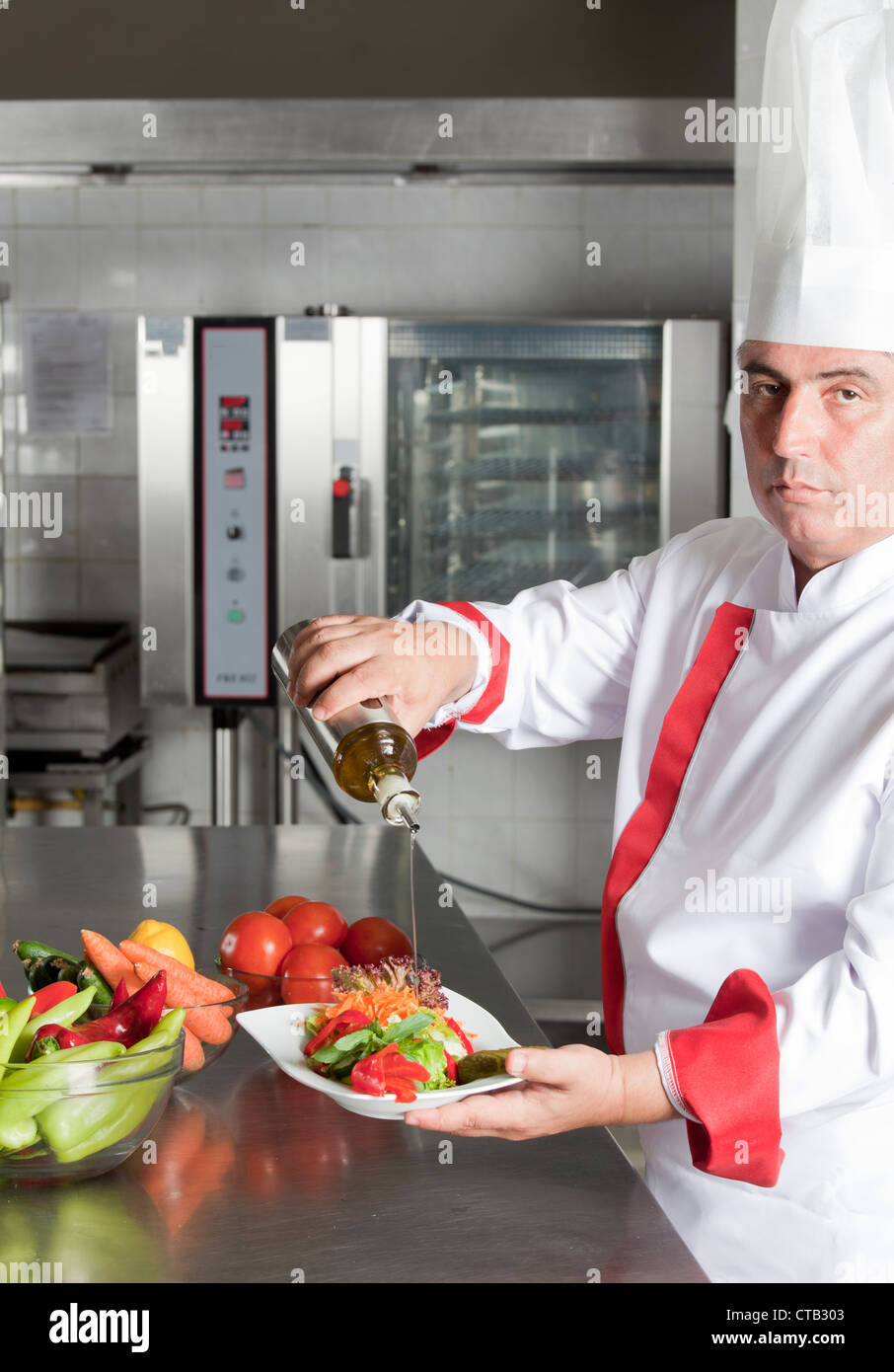 portrait of male chef in kitchen Stock Photo - Alamy