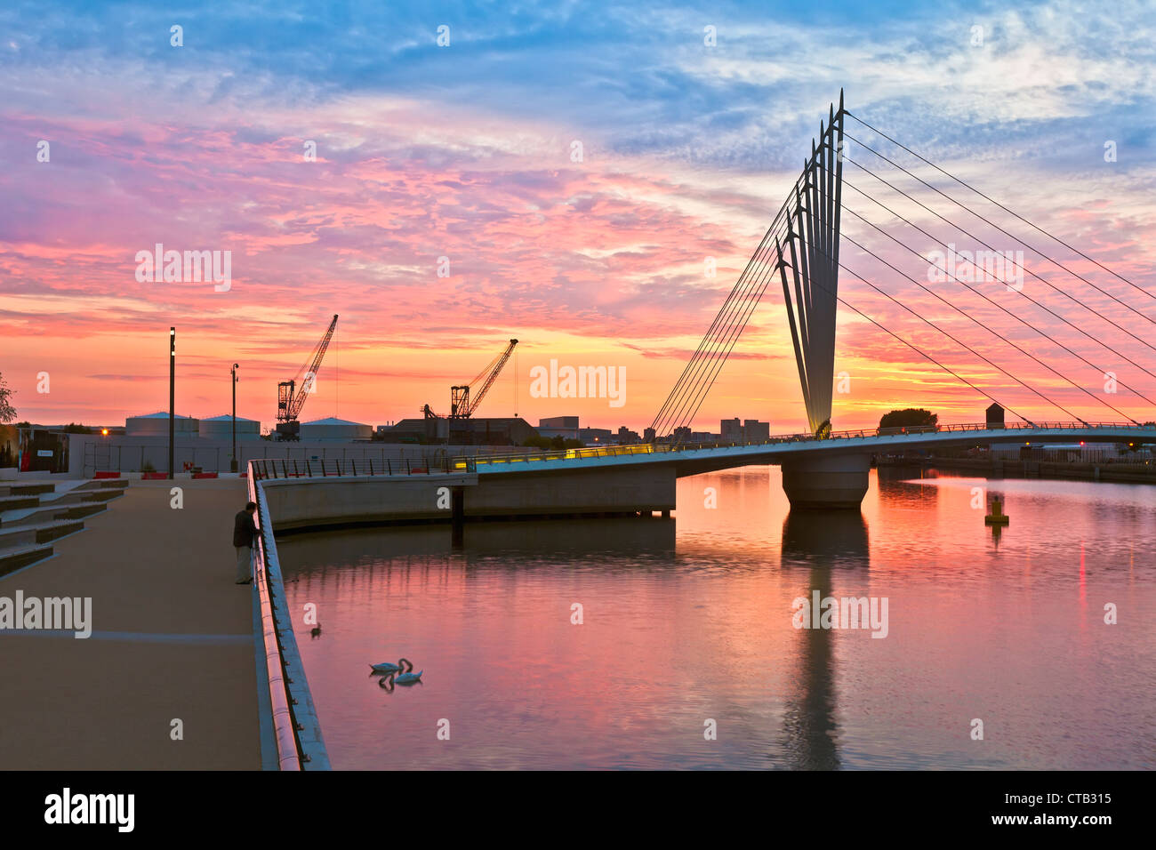 Pedestrian suspension bridge, Salford Quays, Manchester, UK Stock Photo ...