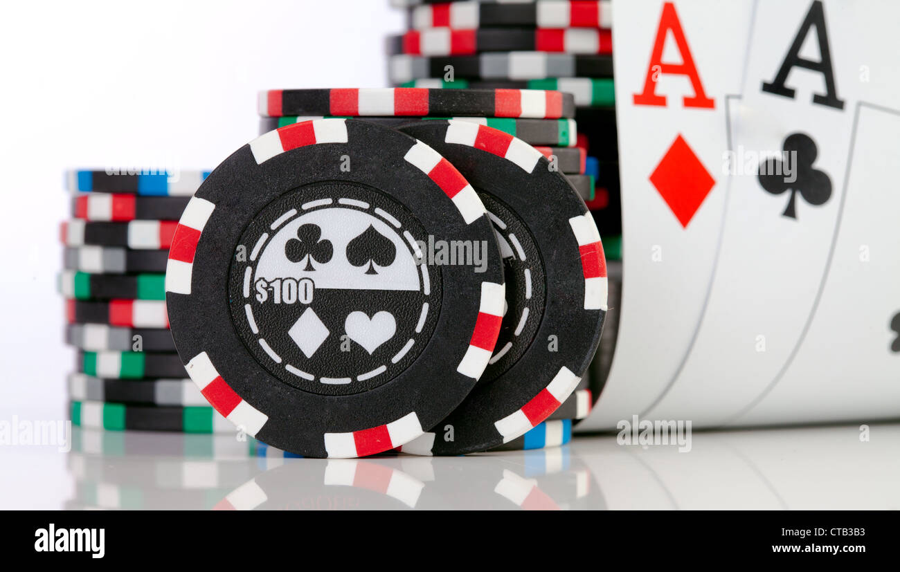 chips and two aces isolated on a white background Stock Photo - Alamy