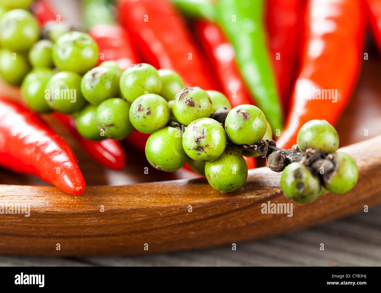 Red chilli peppers and other pepper Stock Photo - Alamy
