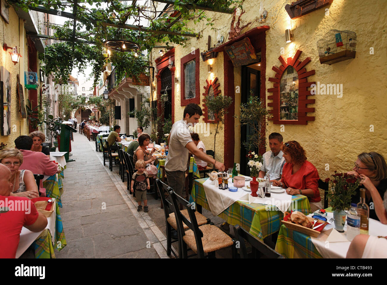 Restaurants in a lane, old town, Rethymnon, Crete, Greece Stock Photo ...