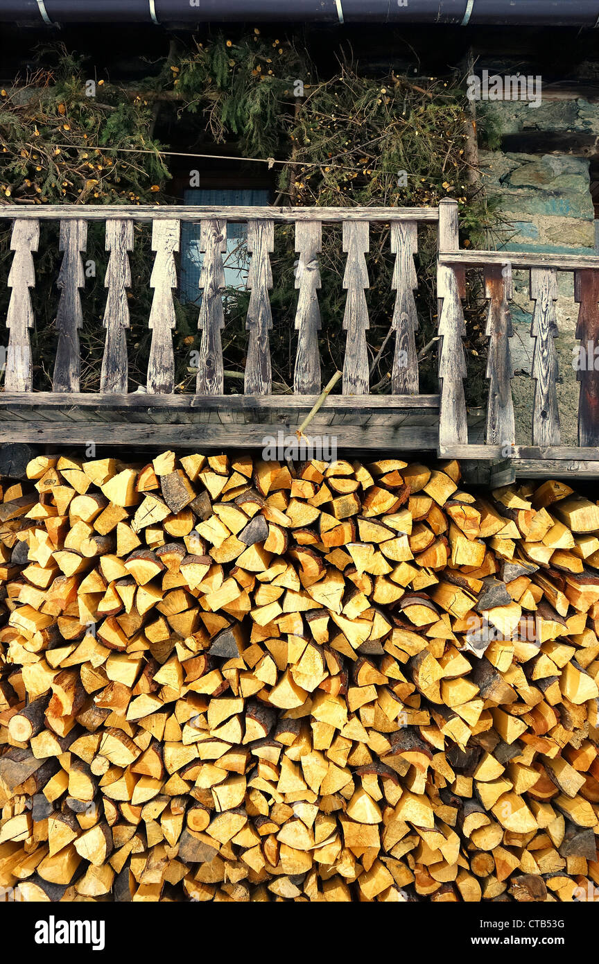 Stack of wood outside an old mountain house Stock Photo - Alamy