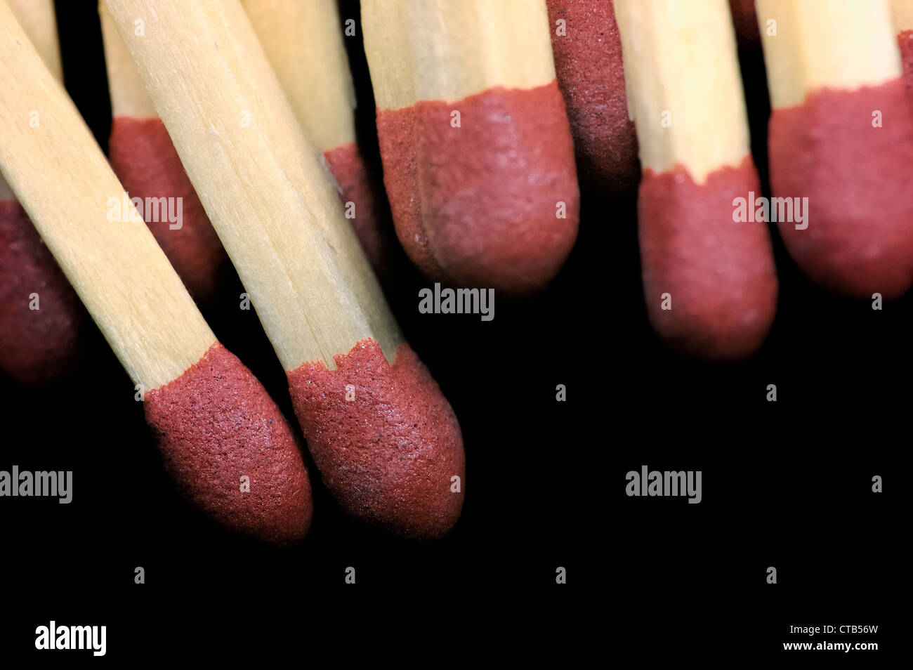Close-up of group of matches, black background Stock Photo - Alamy