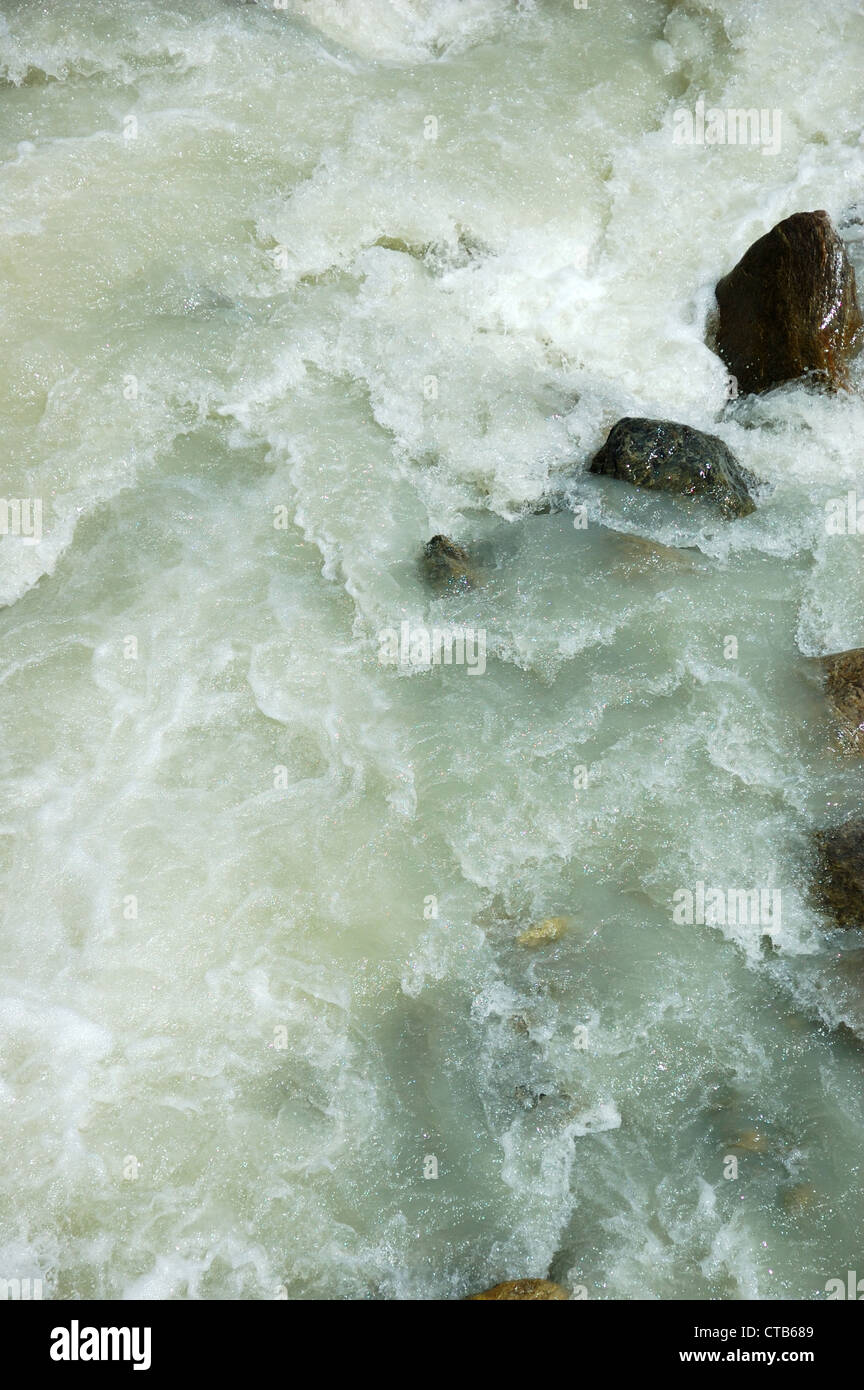 River rapid shot taken with fast shutter speed; vertical orientation ...
