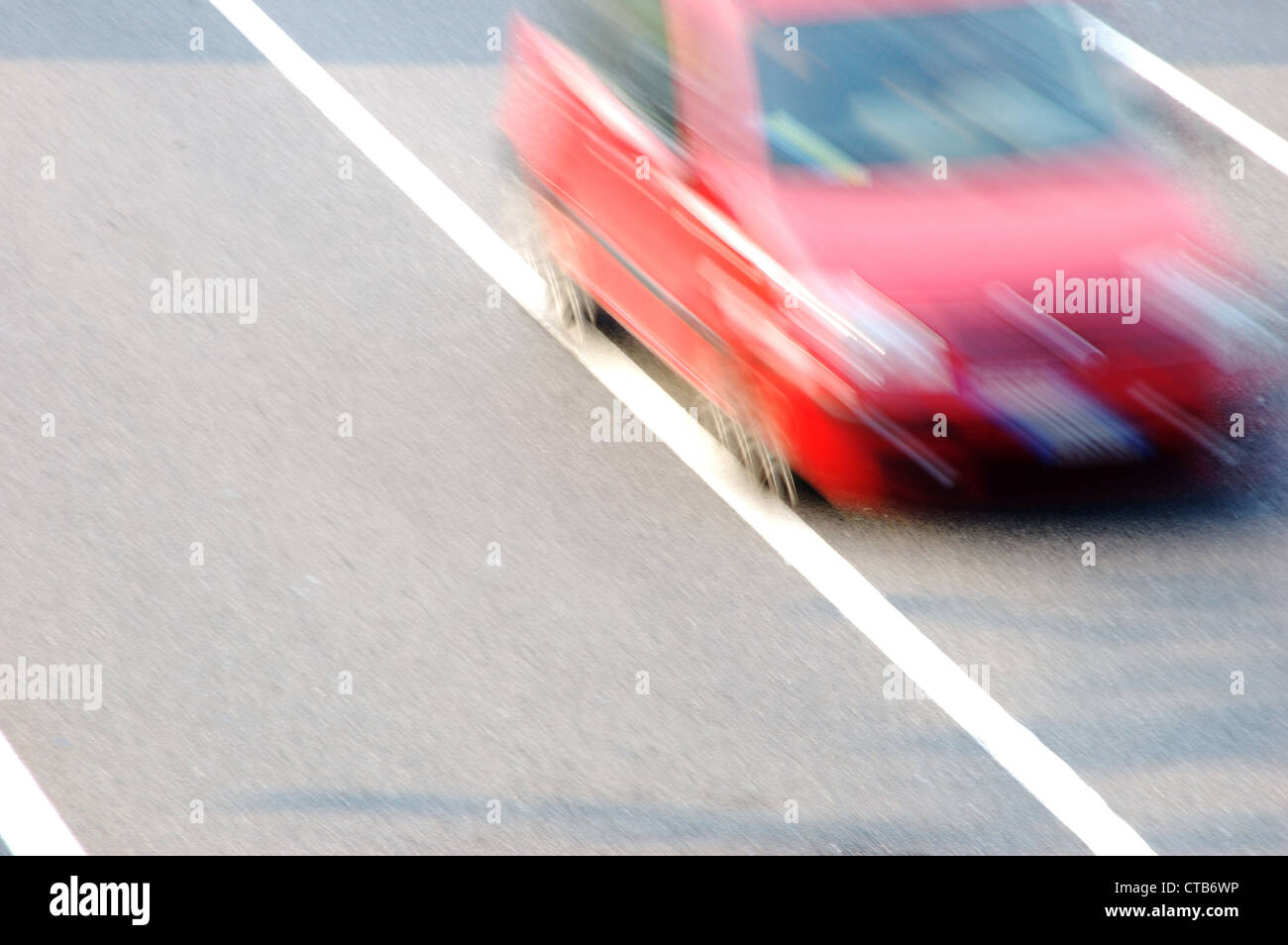 Fast moving red car hi-res stock photography and images - Alamy