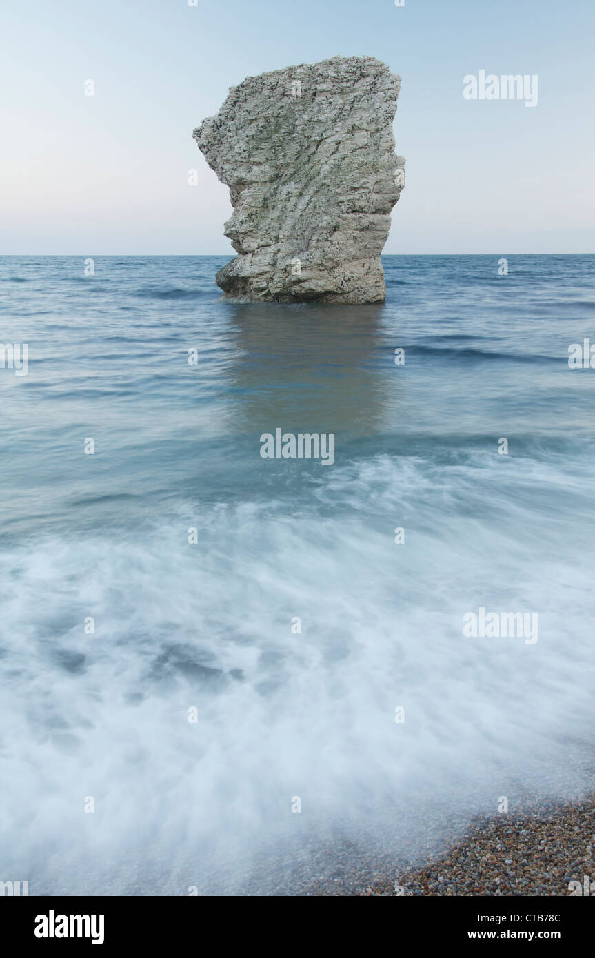 This lonely chalk stack called Butter Rock stands in the sea just off ...