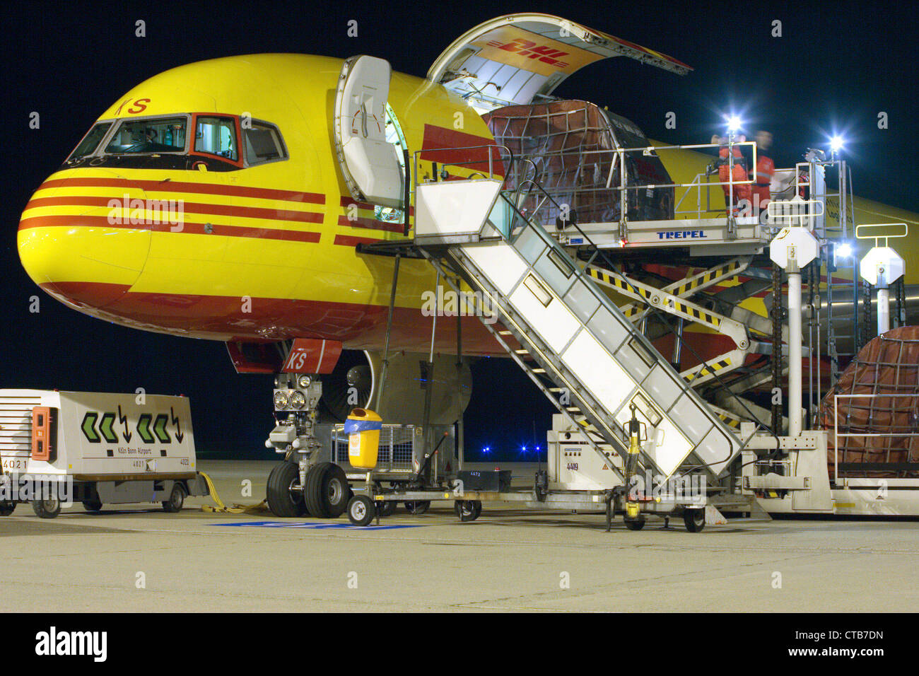 Night shift at the Cologne Bonn Airport, DHL cargo plane Stock Photo ...